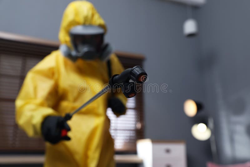 Pest Control Worker in Protective Suit, Focus on Insecticide Sprayer ...