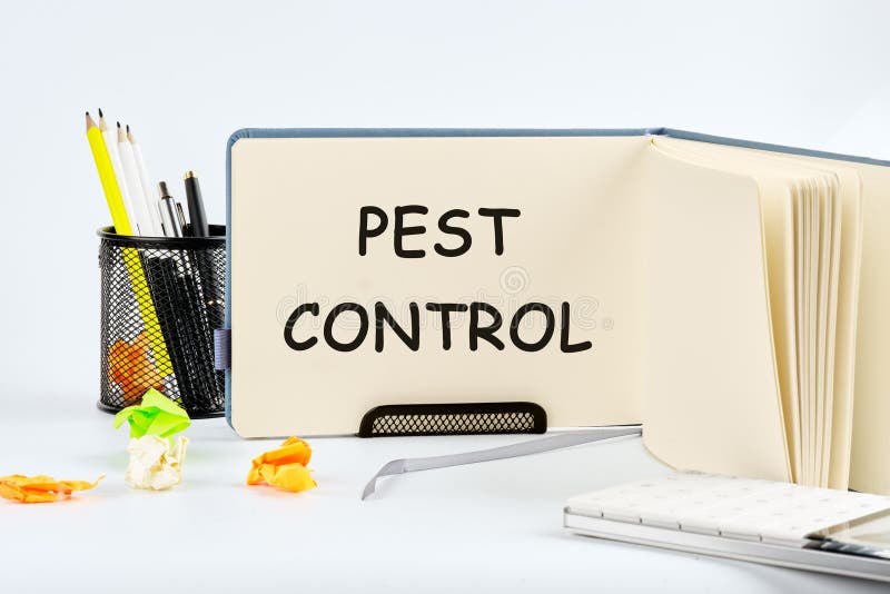 PEST CONTROL Written on a Blank Sheet of Notepad in the Stand Stock ...