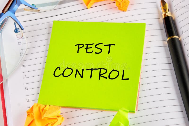 PEST CONTROL Written on a Green Sticker on the Background of an Open ...