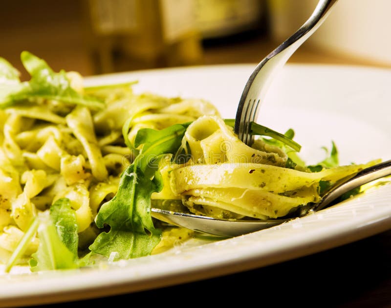 Pesto Pasta stock photo. Image of fork, diet, basil - 125027102