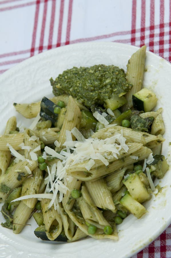 Pesto pasta on plate stock image. Image of lunch, green - 50997461