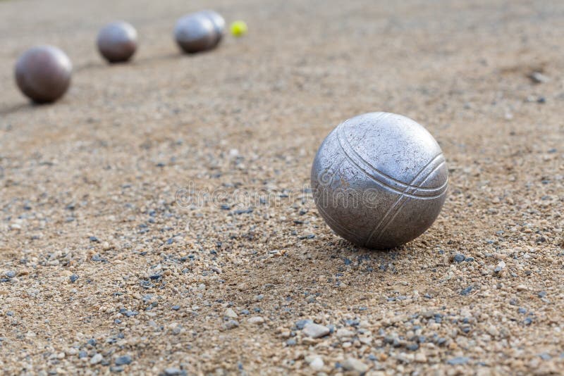 Petanque Balls with a Jack (cochonnet) Stock Photo - Image of white ...