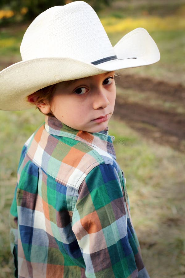Petit cowboy photo stock. Image du bonheur, visage, gens - 3475744