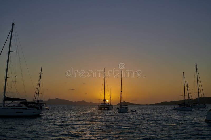 Petit Rameau Sunset, St Vincent and the Grenadines Catamarans Stock ...