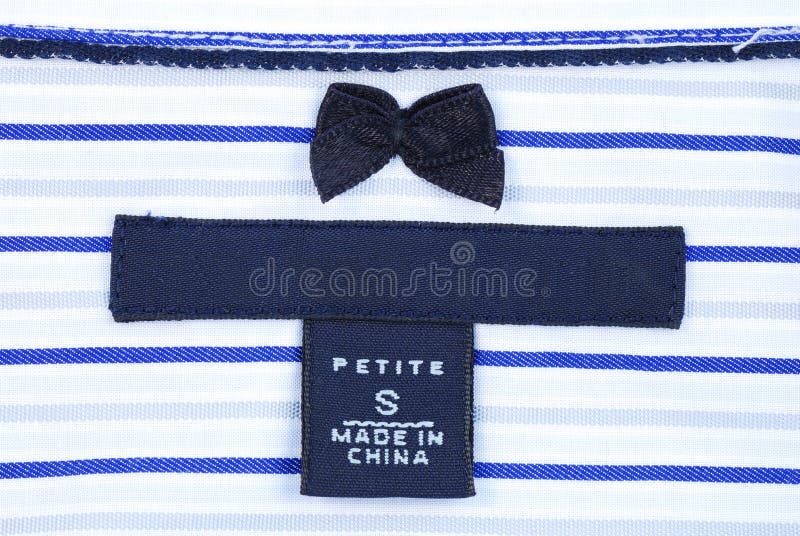 Petite-size clothing label stock image. Image of texture - 15597831