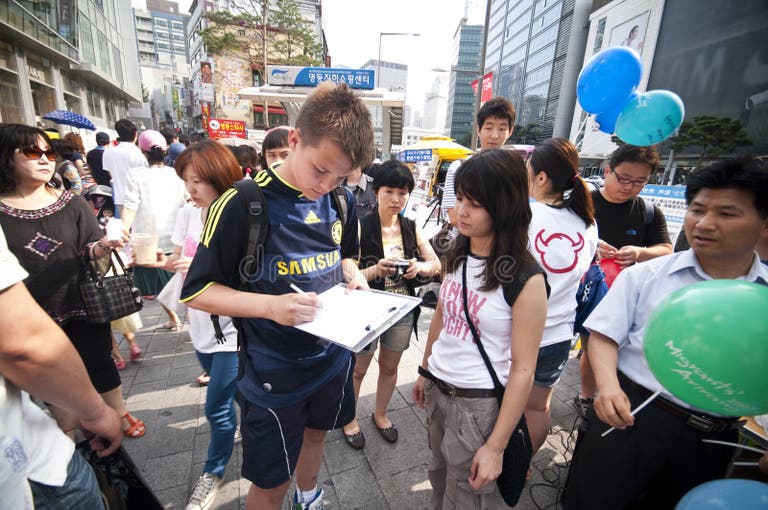 Petition signing editorial stock image. Image of young - 20443814