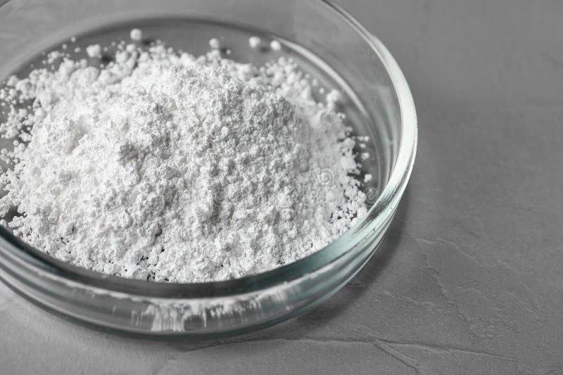 Petri Dish with Calcium Carbonate Powder on Grey Table, Closeup Stock ...