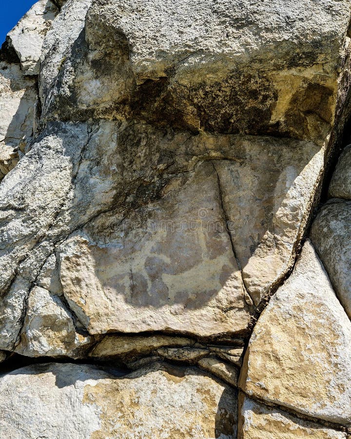 Petroglyphs on a Rock, a Cape on Lake Baikal. Drawings of Ancient ...