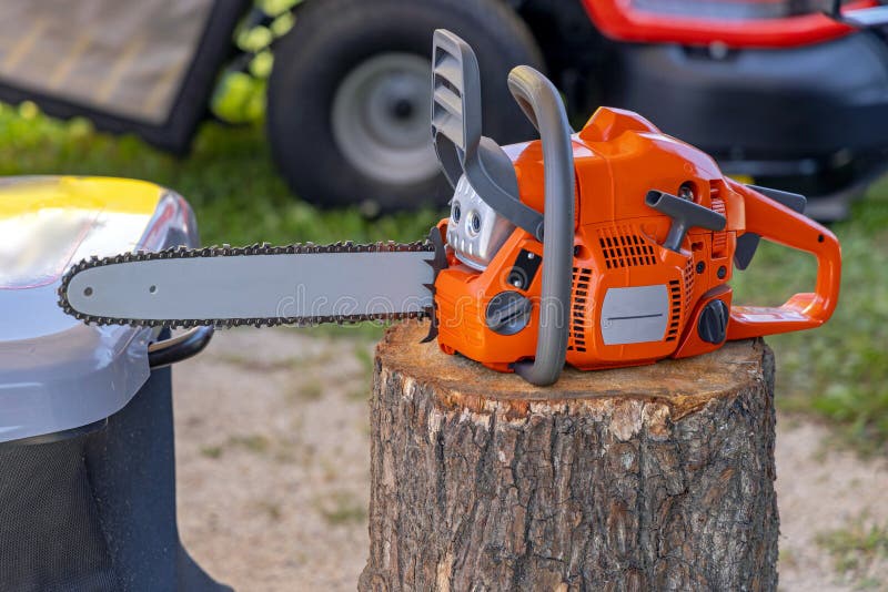 Petrol Powered Chainsaw stock photo. Image of lumber - 279609726