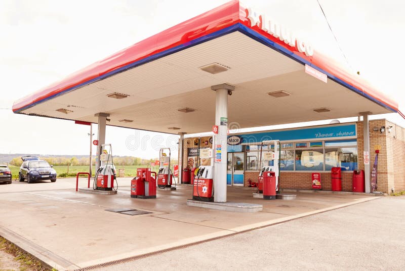 The Exterior of a BP Petrol Station or Gas Station with a Car Entering ...