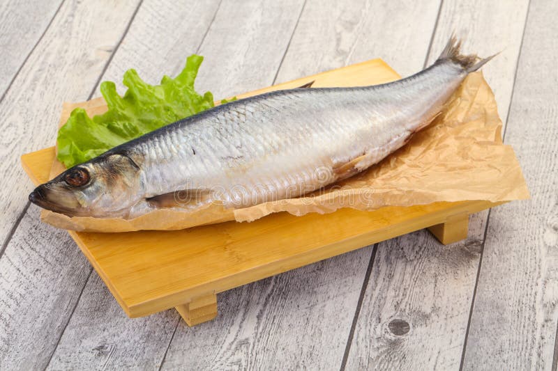 Pez arenque salado foto de archivo. Imagen de alimento - 174646976