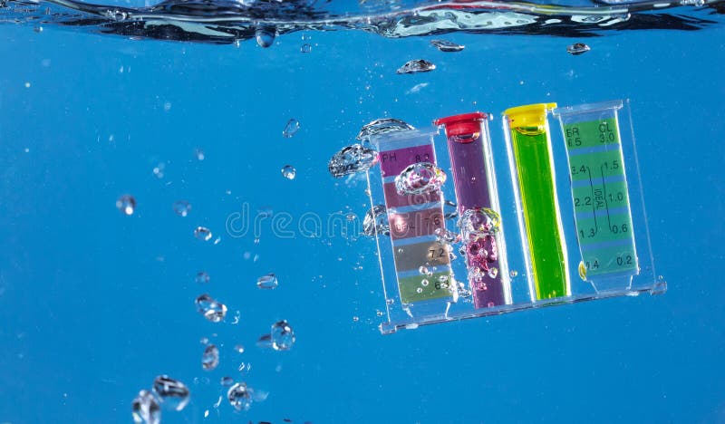PH Acid Level Test Kit on Quality Water on Screen. PH Acid Level Tester ...