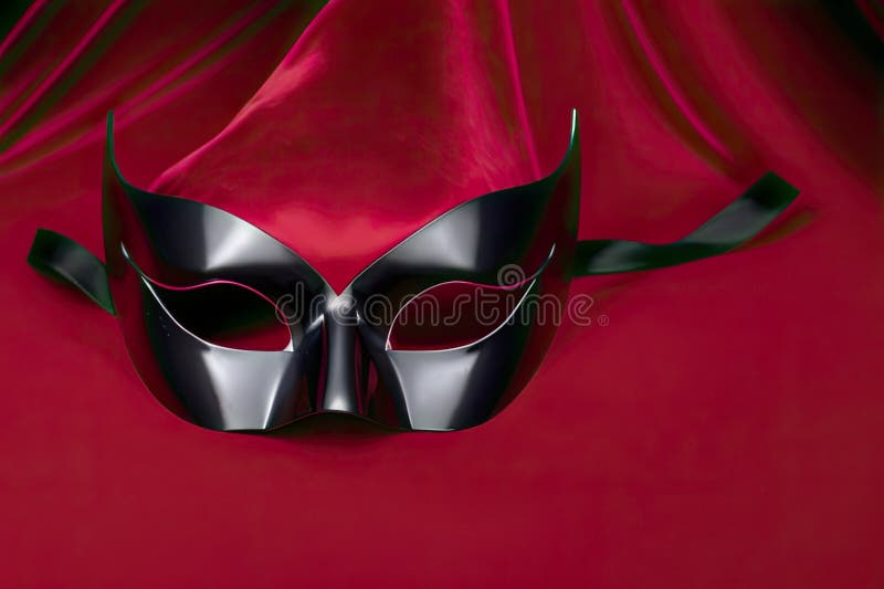 A Phantom of the Opera Mask Against a Rich, Velvet Red Background ...