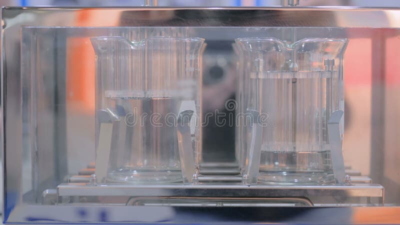 Automatic Tablet Disintegration and Dissolution Apparatus Stock Video ...