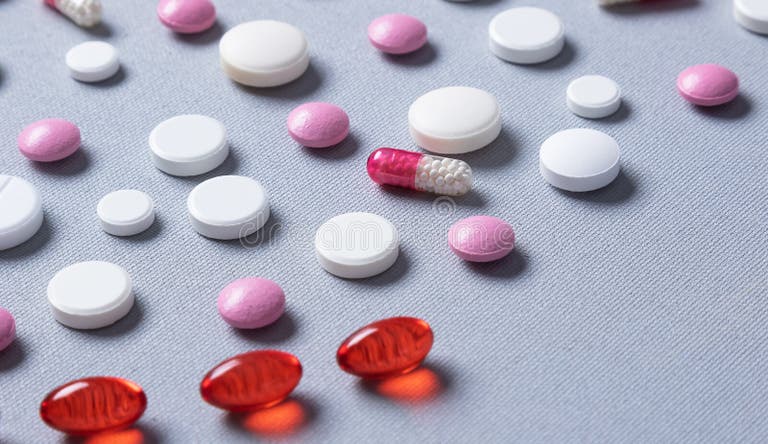 Pharmaceutical Background of Tablets of Three Colors and Sizes ...