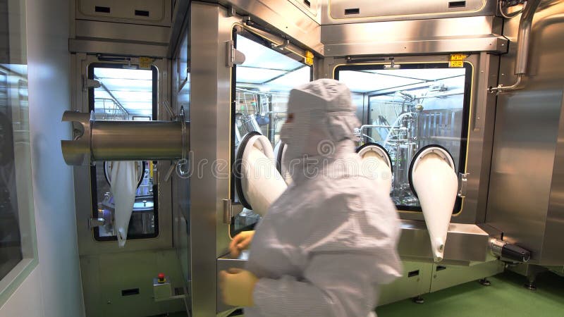 Pharmaceutical Machine Operators at Work. Pharmaceutical Industry ...