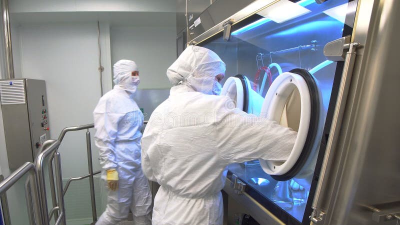 Pharmaceutical Machine Operators at Work. Pharmaceutical Industry ...