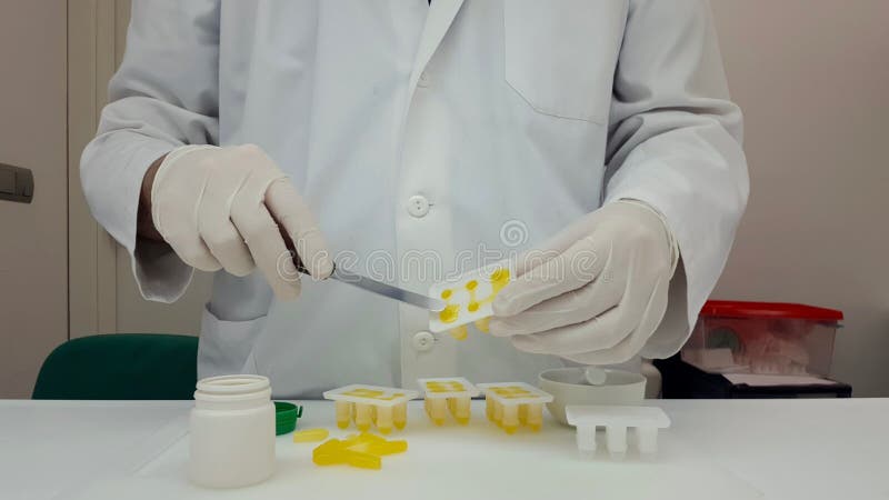 Pharmaceutical Making Yellow Suppositories Stock Photo - Image of ...