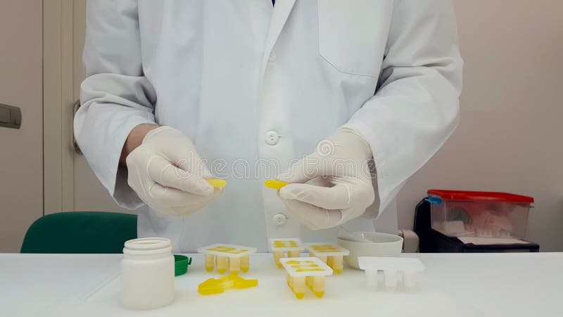 Pharmaceutical Making Yellow Suppositories Stock Image - Image of ...