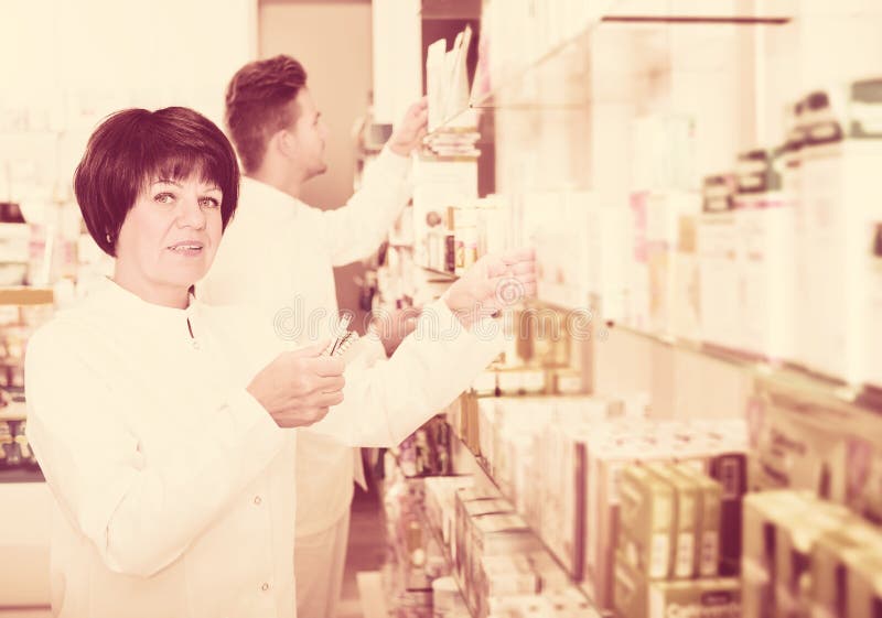 Pharmaceutist Working in Chemist Shop Stock Photo - Image of european ...