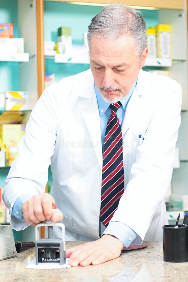 Pharmacist at work stock photo. Image of barcode, medicine - 26708764