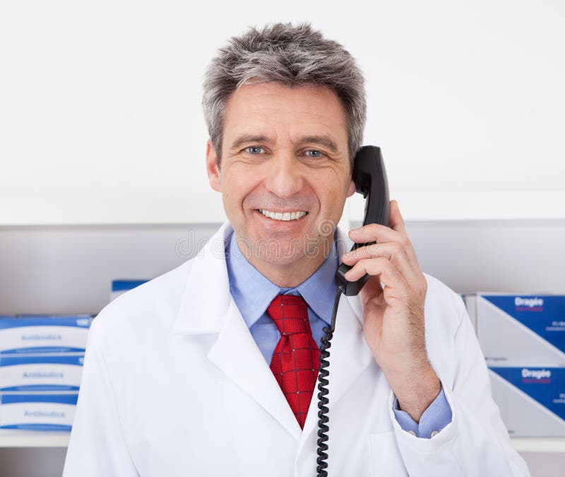 Pharmacist Calling on the Phone Stock Photo - Image of communication ...