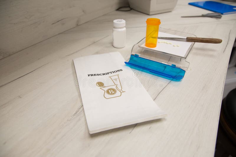 Pharmacist Filling Prescriptions Stock Photo - Image of cure, holding ...