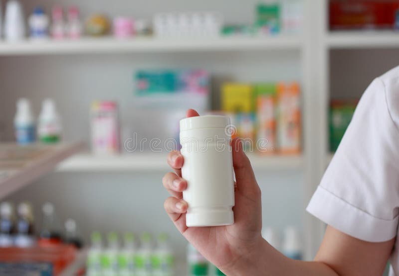 Pharmacist Hand Holding Medicine Bottle Stock Image - Image of chemist ...