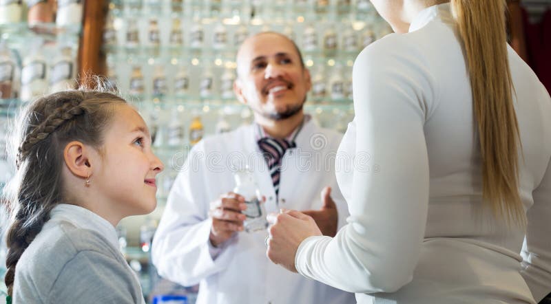 Pharmacist Helping Customers Stock Photo - Image of indoors ...