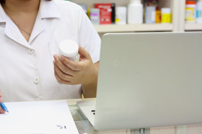 Pharmacist with Laptop Computer Stock Photo - Image of health, person ...