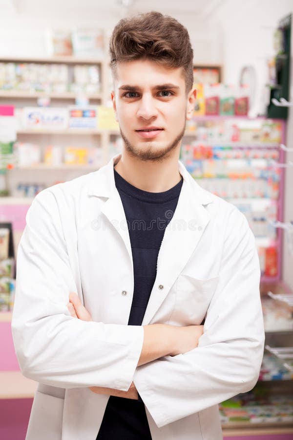 Pharmacist Man at Work Looking in Camera Stock Photo - Image of ...