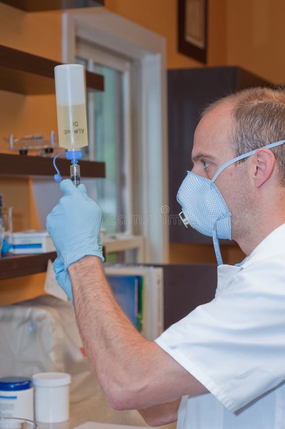 Pharmacist mixing medicine stock photo. Image of profession - 9646854