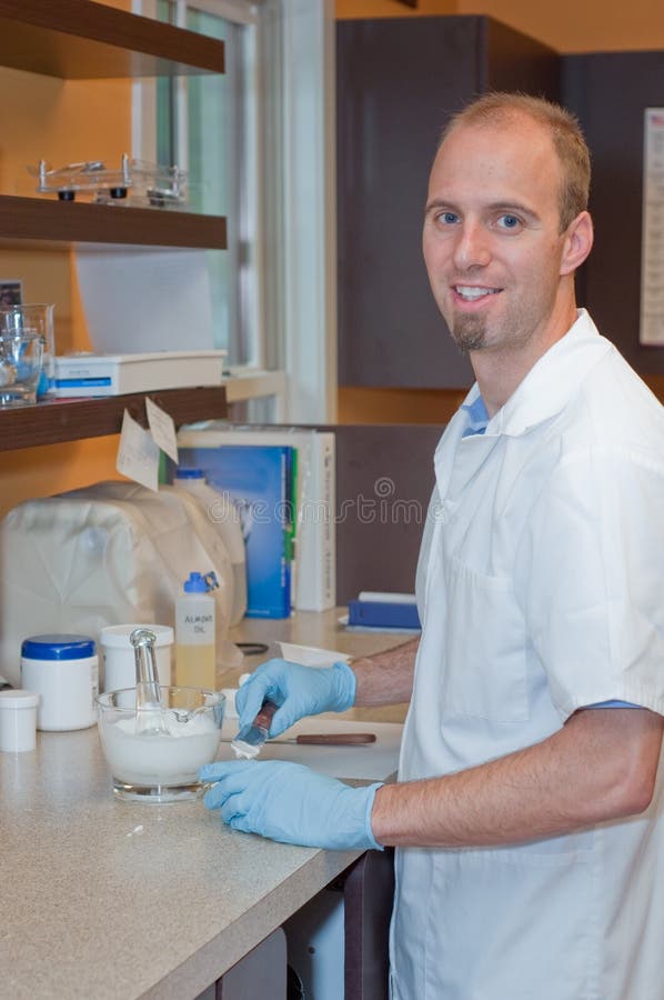 Pharmacist mixing medicine stock photo. Image of color - 9646906