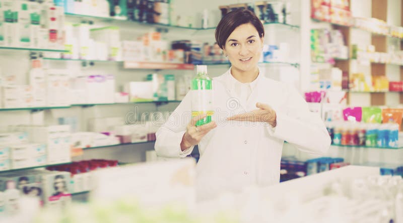 Pharmacist Offering Products of Body Care Stock Image - Image of person ...