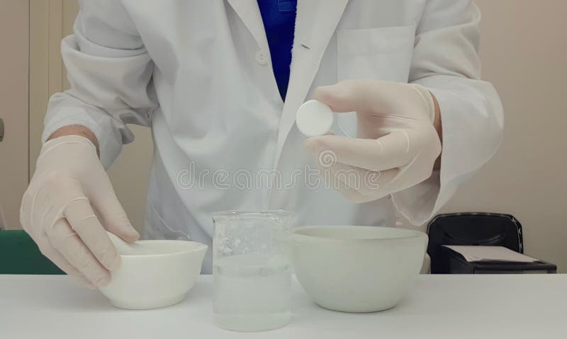 Pharmacist Performing a Quality Control of Effervescent Tablets Stock ...