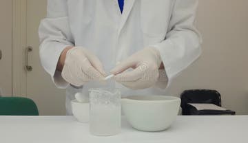 Pharmacist Performing a Quality Control of Effervescent Tablets Stock ...
