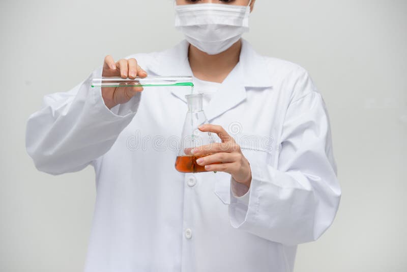Pharmacist Preparing Medicine in Lab. she is Mixing Ingredients To ...