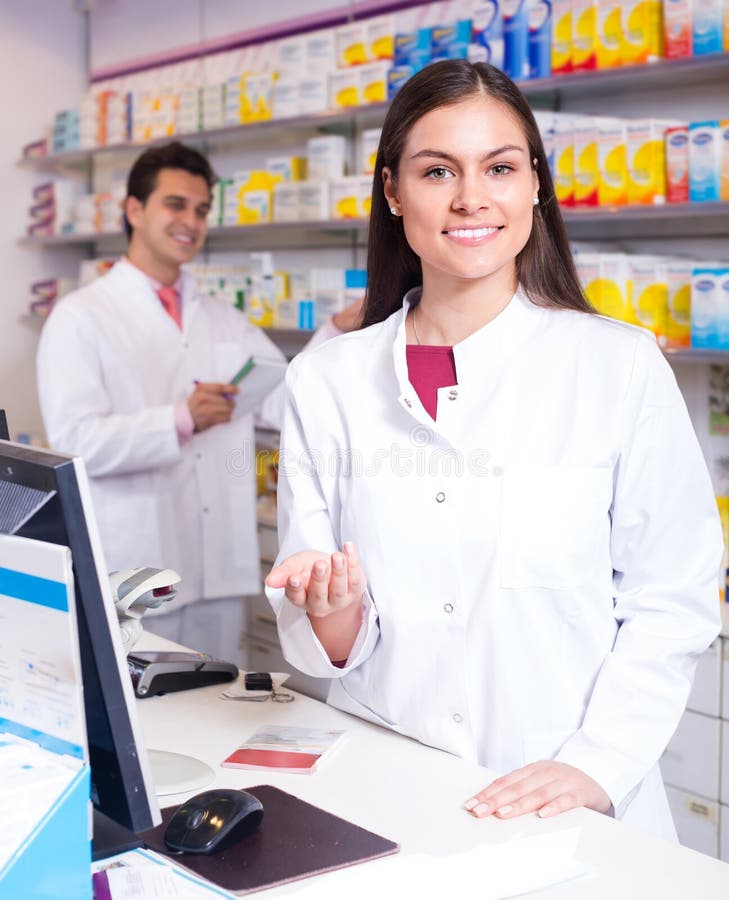 Pharmacist at Reception of Drugstore. Stock Image - Image of business ...