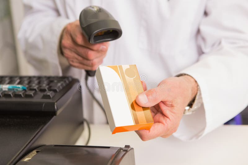 Pharmacist Scanning Barcode of Drug in a Pharmacy Stock Photo - Image ...