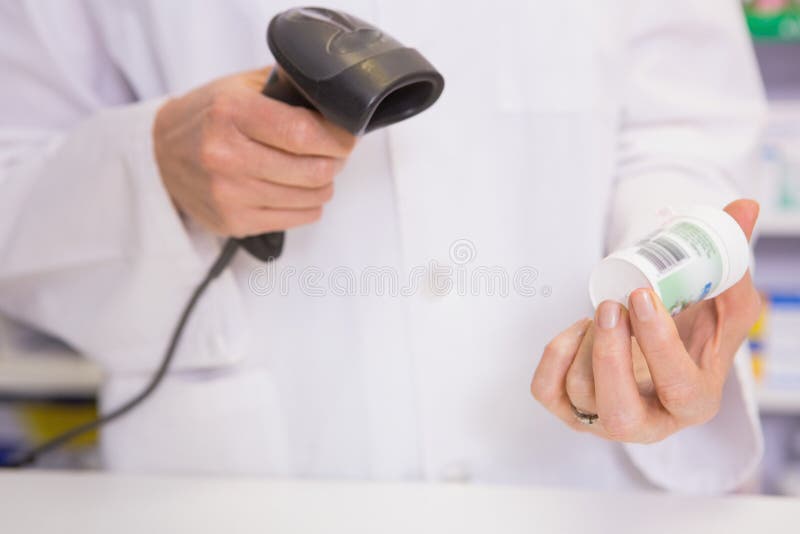 Pharmacist Scanning Medication with a Scanner Stock Image - Image of ...