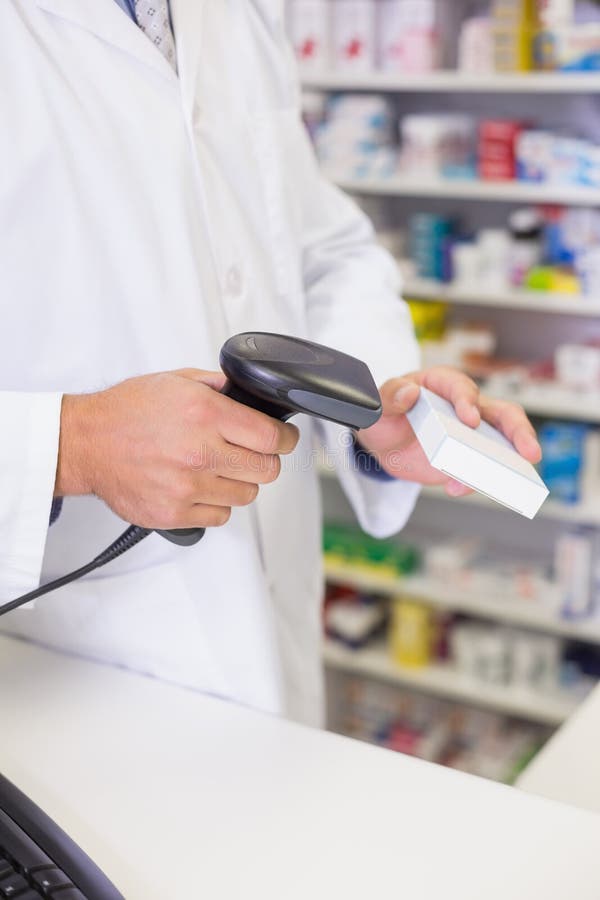 Pharmacist Scanning Medicine Bottle with Barcode Scanner in Pharmacy ...