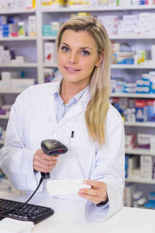 Pharmacist Scanning Medication with a Scanner Stock Image - Image of ...
