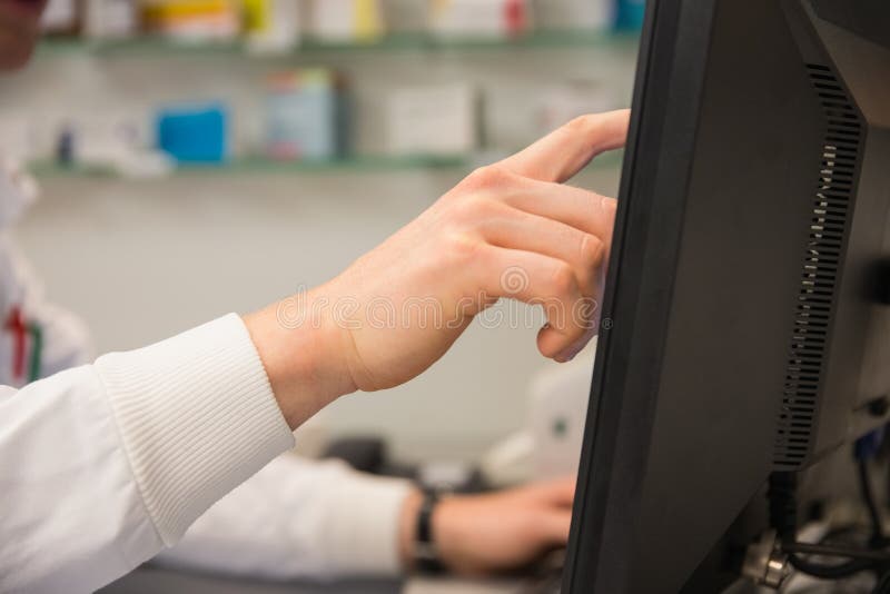 Pharmacist Using the Computer Stock Image - Image of treatment ...