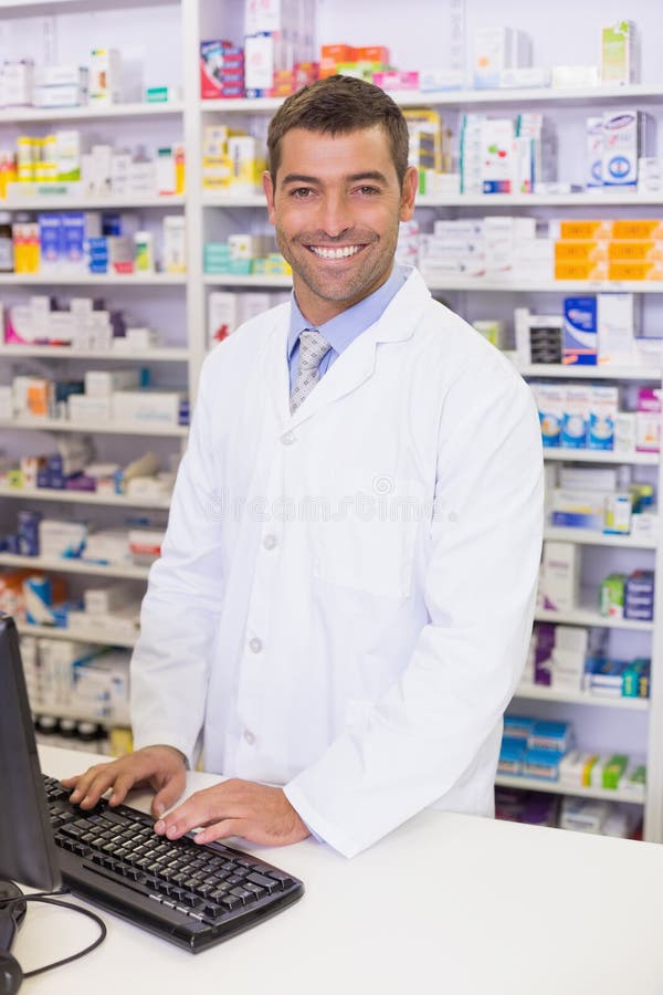 Pharmacist Using the Computer Stock Photo - Image of pharmaceutics ...