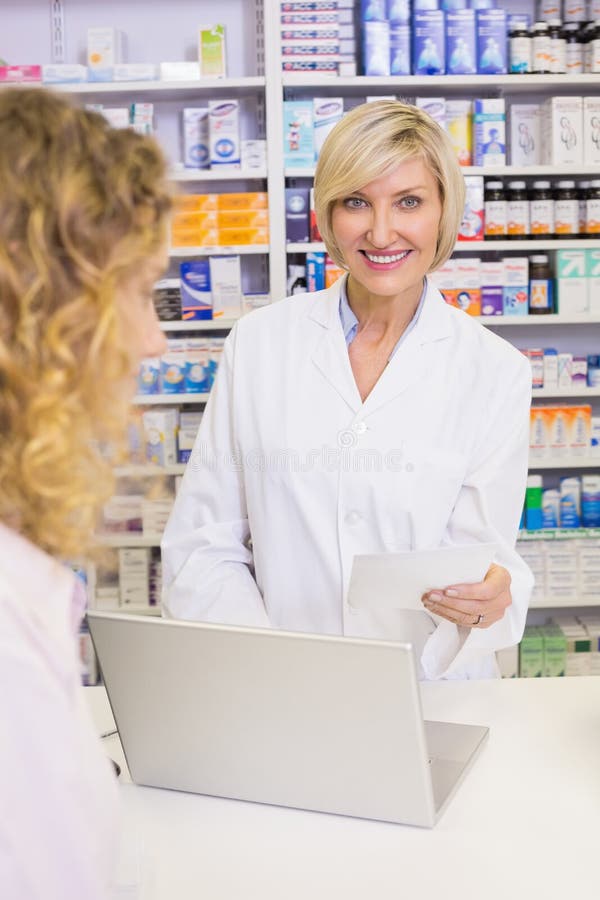 Pharmacist Using the Computer Stock Photo - Image of storage ...
