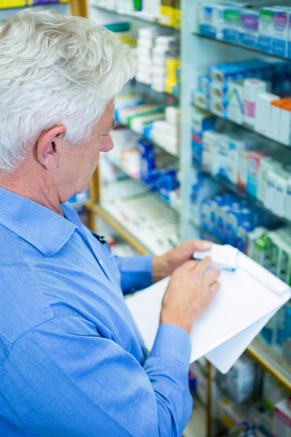 Pharmacist Writing on Clipboard Stock Image - Image of medical ...