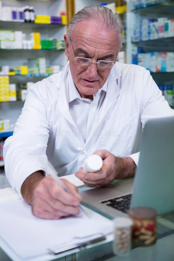 Pharmacist Writing Prescriptions for Medicines Stock Image - Image of ...