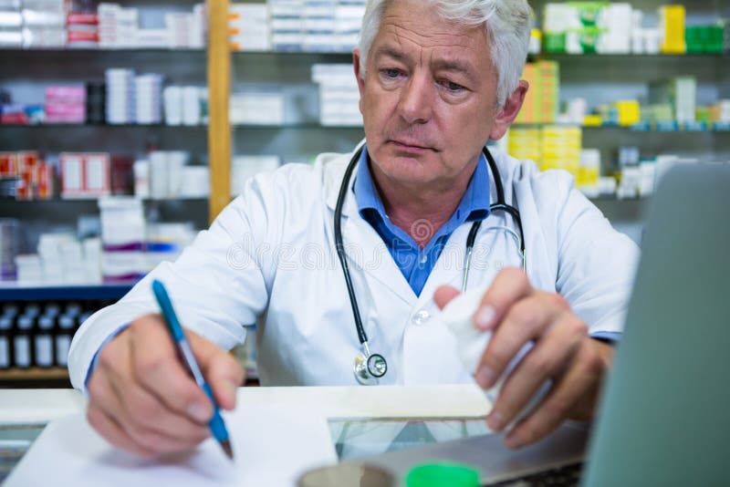 Pharmacist Writing Prescriptions for Medicines Stock Image - Image of ...