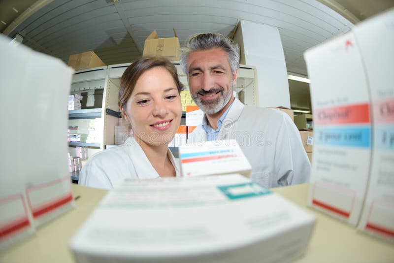 Pharmacists Checking Medicines Shelf Pharmacy Stock Photos - Free ...