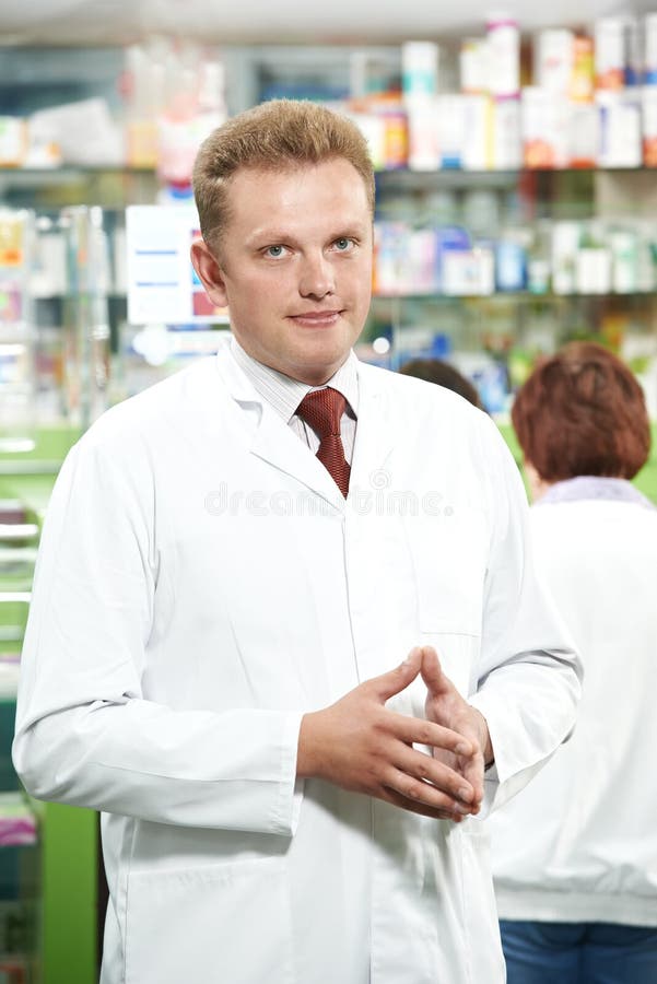 Smiling Pharmacy Chemist Man in Drugstore Stock Photo - Image of happy ...